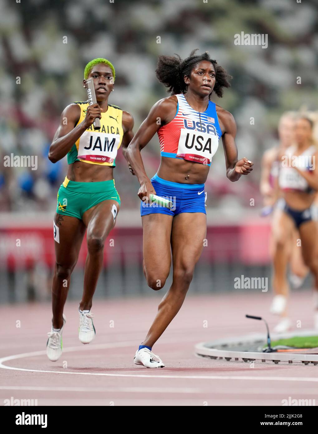 Kendal Ellis participating in the 4x400 meter relay at the 2020 Tokyo ...