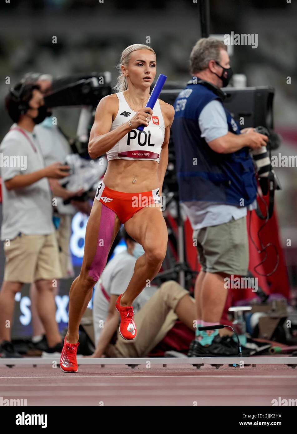 Justyna Swiety-Ersetic participating in the 4x400 meter relay at the ...