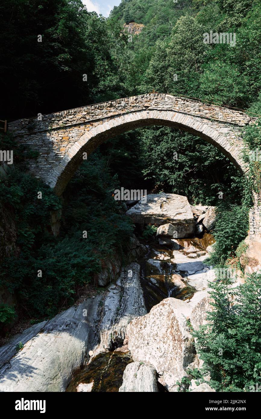 Aosta Valley, Italy - The ancient Roman bridge over the river in the ...