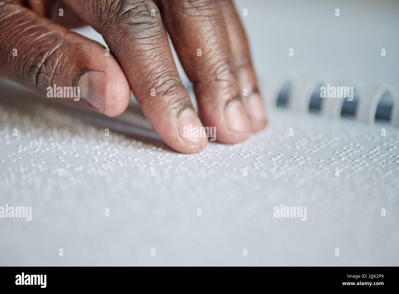 African blind reading hand hi-res stock photography and images - Alamy