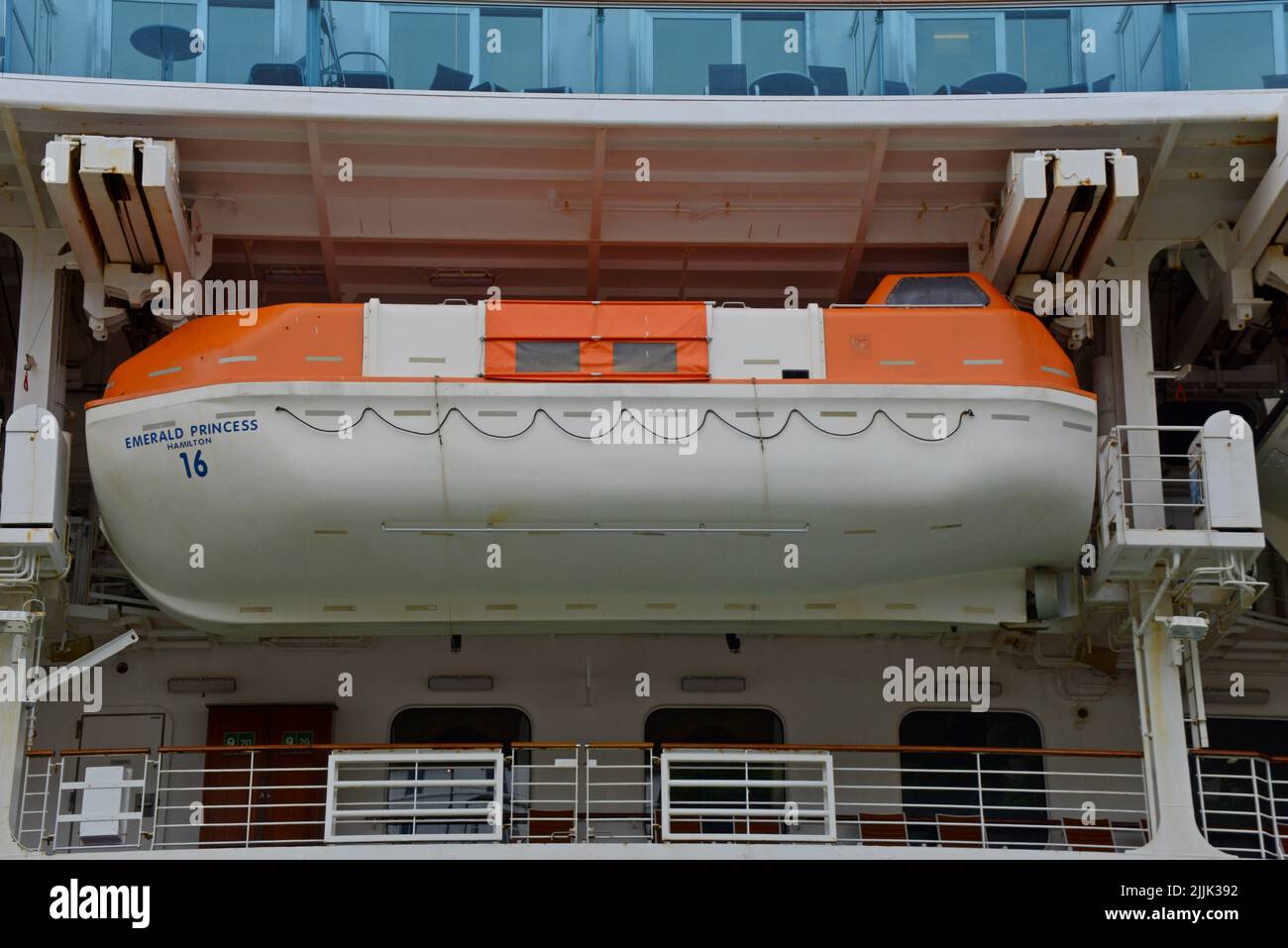 Lifeboats on the Emerald Princess cruise ship moored alongside the ...