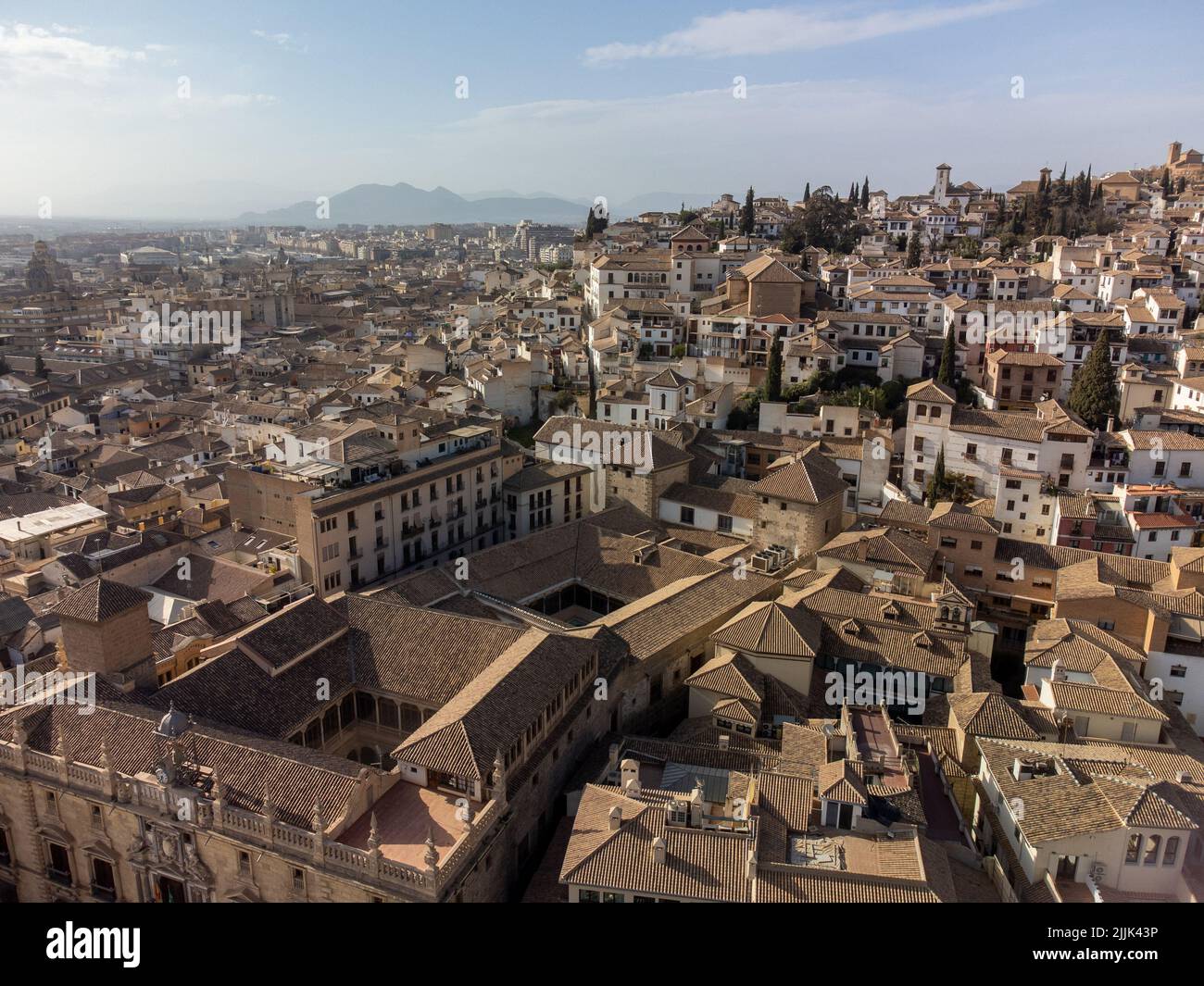 Aerial panoramic view on buildings, old district, mountains and palace ...