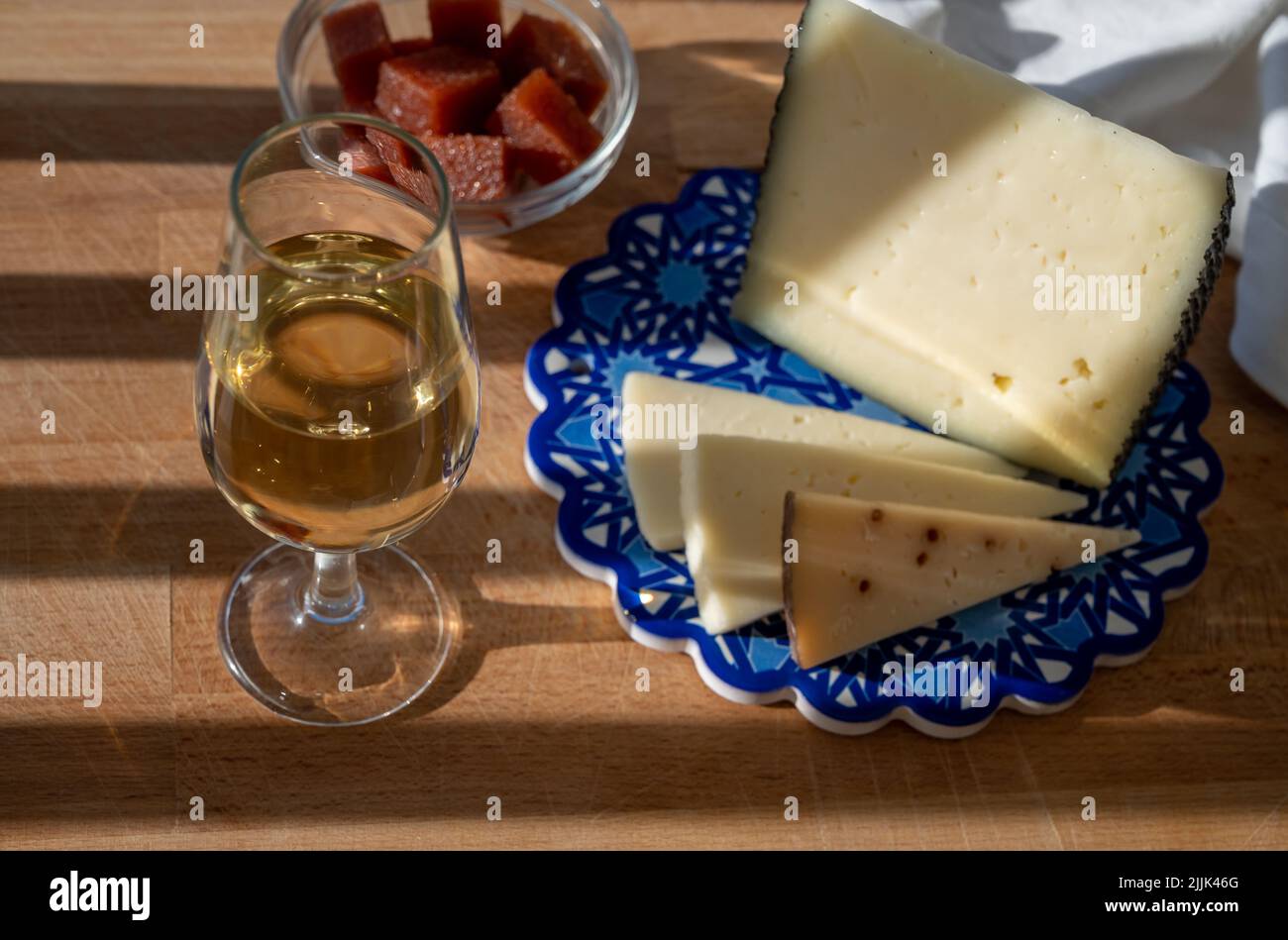 Spanish hard manchego, cow, sheep and goat cheeses served outdoor with ...