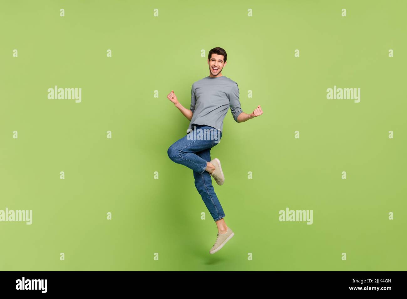 Full size photo of overjoyed ecstatic jumping positive man celebrate ...