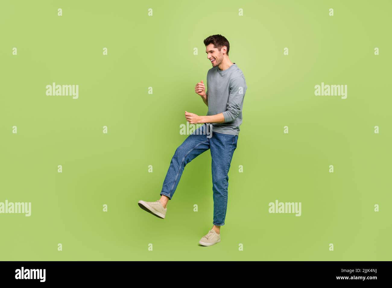 Full body profile side photo of good mood delighted male enjoy dancing ...