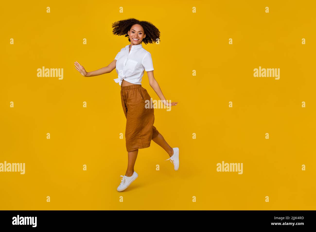 Full length portrait of overjoyed active person jumping toothy smile ...