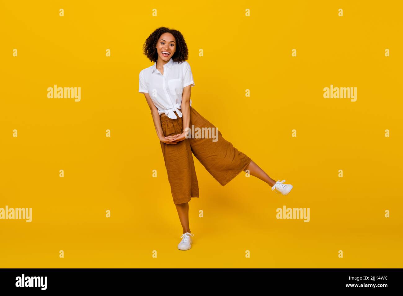 Full body photo of crazy funky playful lady have fun dance raise leg ...