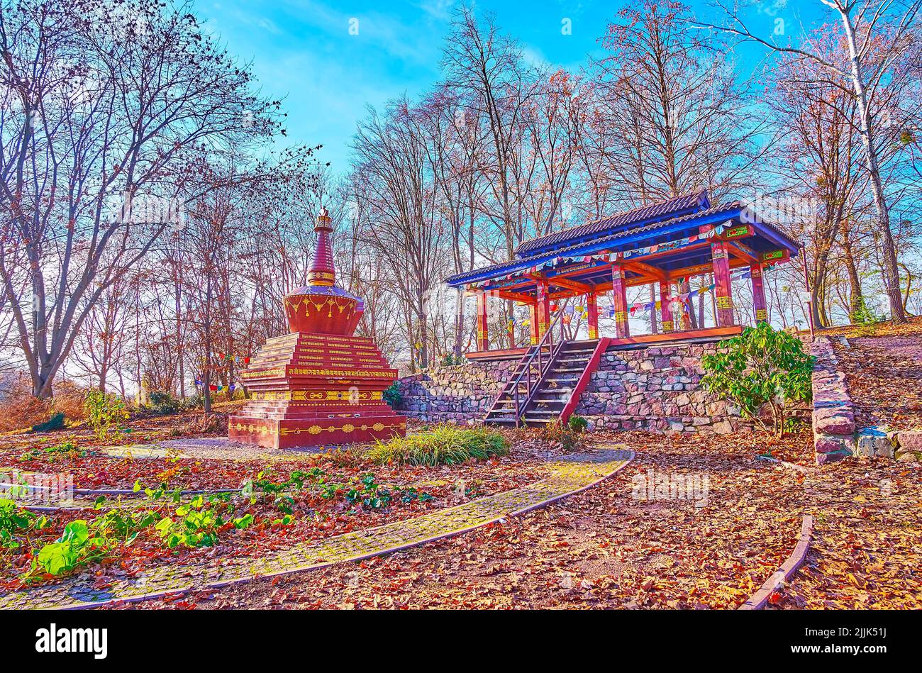 Tibetan Garden with colorful Buddhist flags, wooden Gazebo for ...