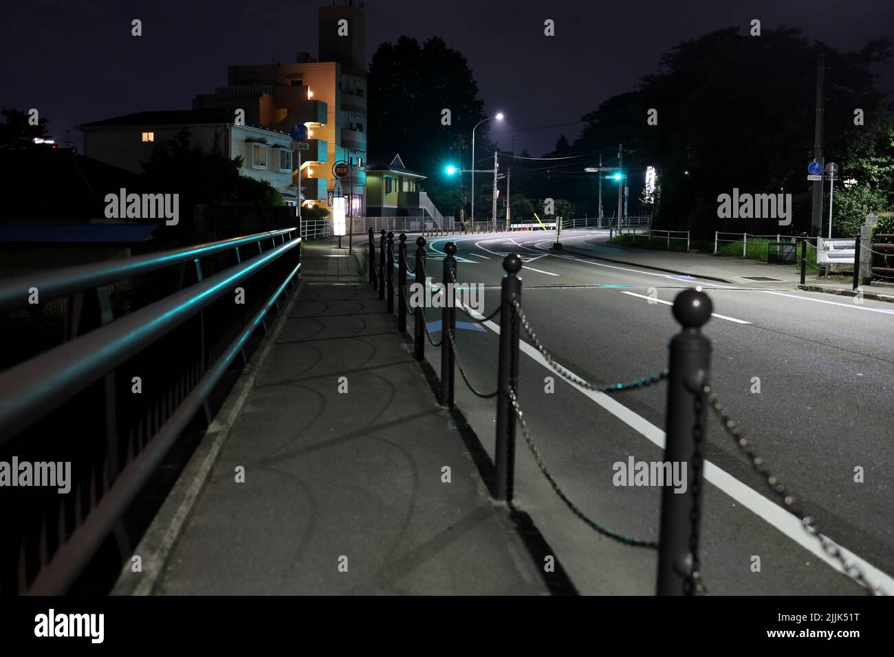 The light of the bus stop seen from the bridge at night Stock Photo - Alamy