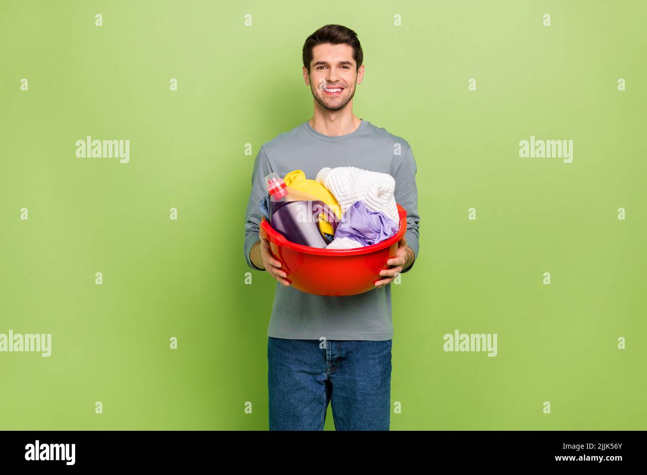 Photo of good mood cheerful man doing household chores cleaning dirty ...