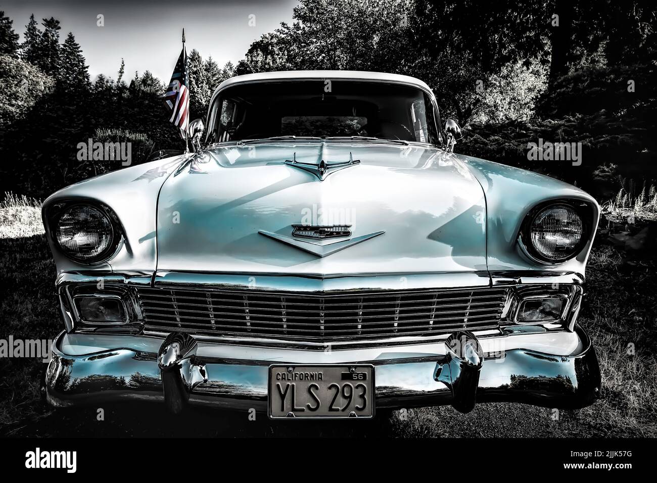 A front view of a parked heavy metal vintage classic Chevrolet car ...