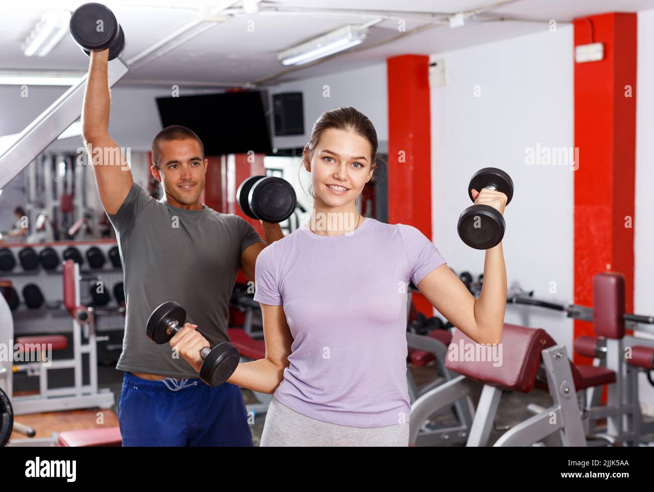 Portrait couple doing physical exercise hi-res stock photography and ...