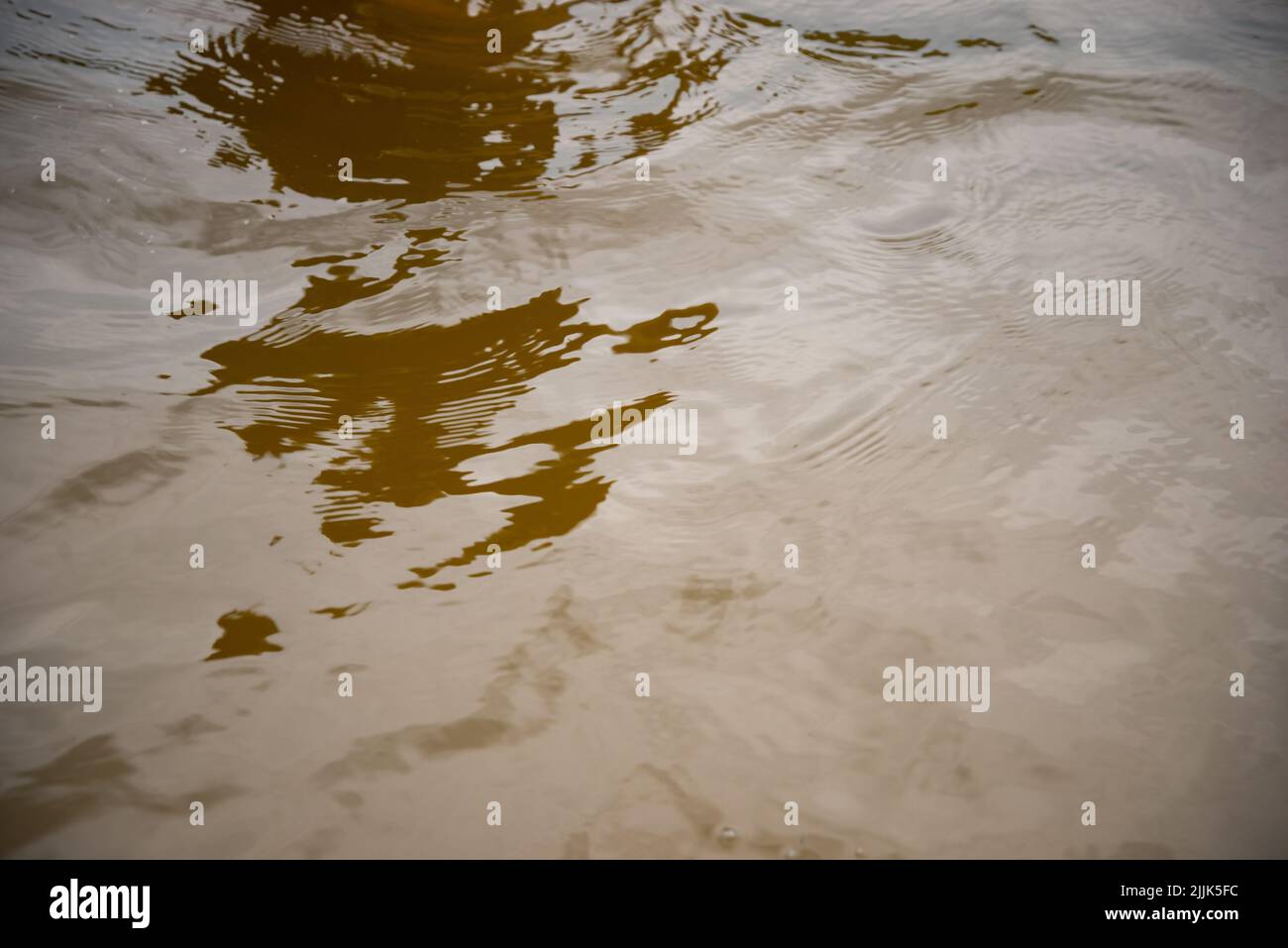 Water surface with brightness in the distance Stock Photo - Alamy