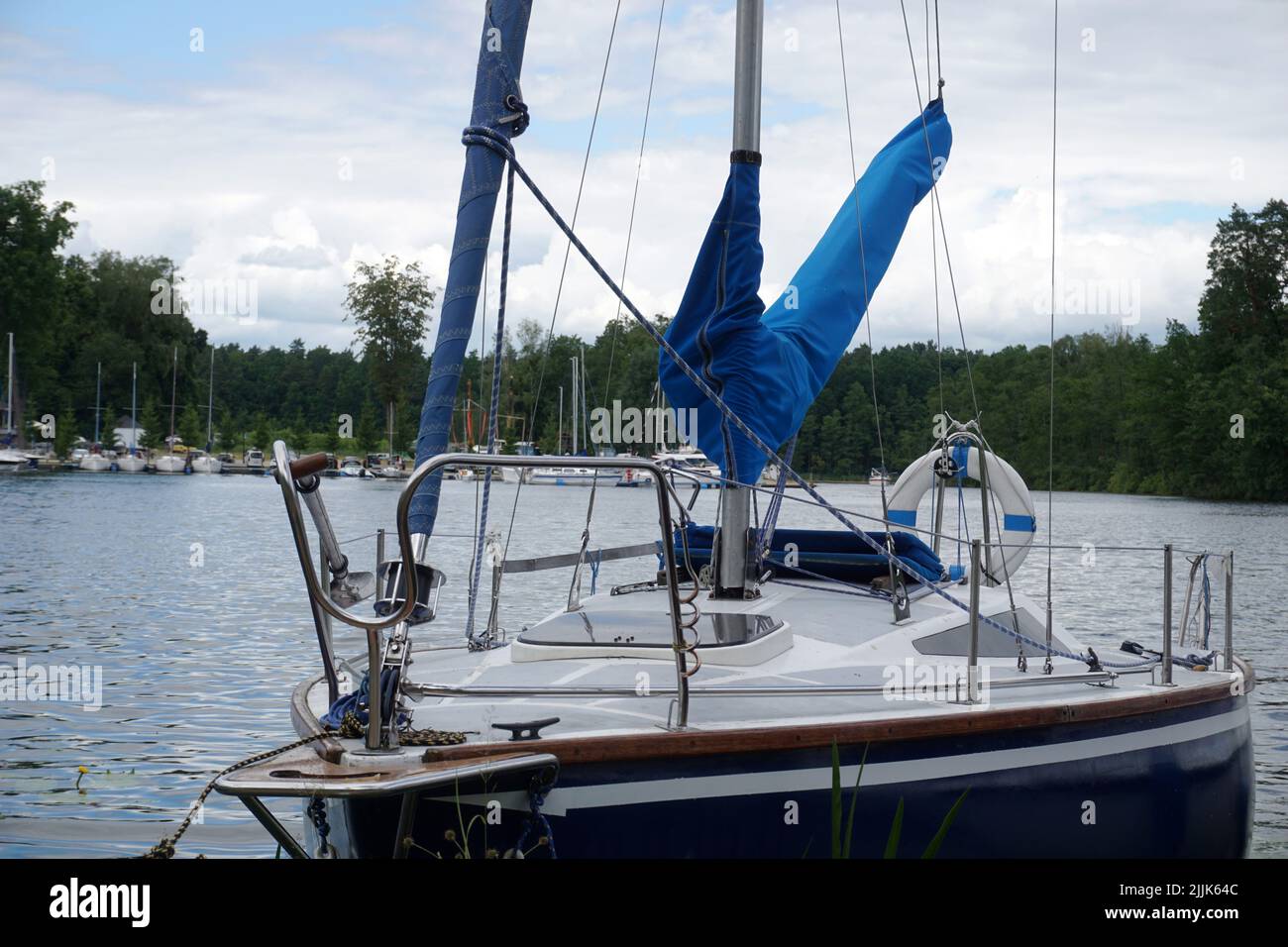 Sailboat moored in port - front view Stock Photo - Alamy