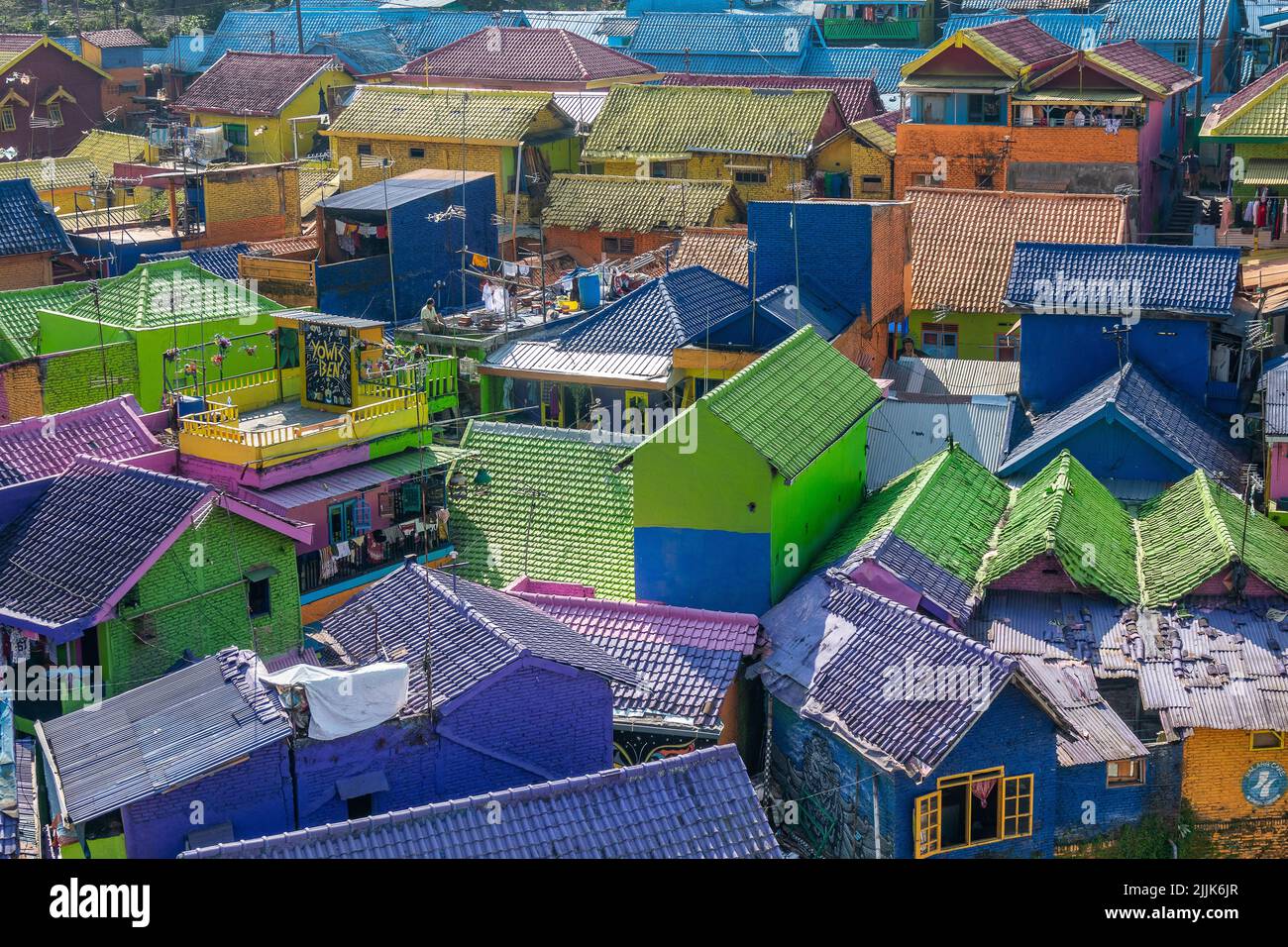 An aerial view of bright colorful painted houses in Malang, Indonesia ...