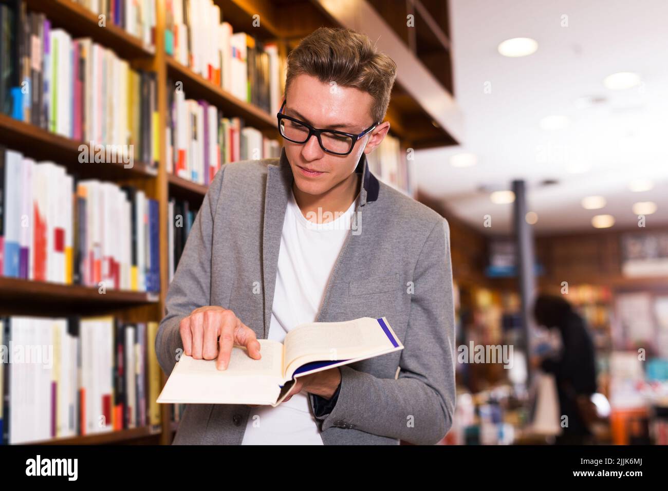 Man pointing open book hi-res stock photography and images - Alamy