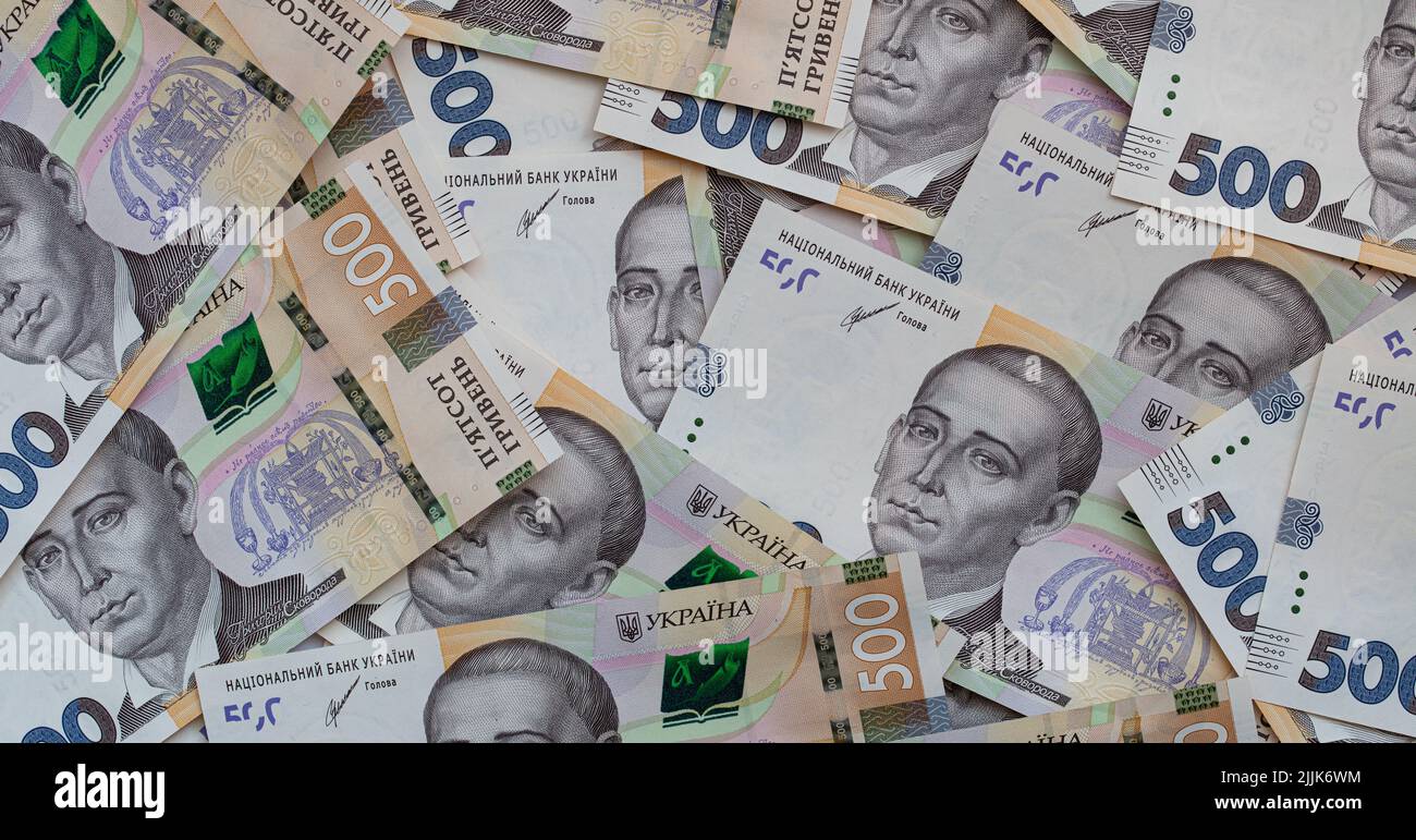 100 dollar and 500 hryvnyas banknotes background for design purpose ...