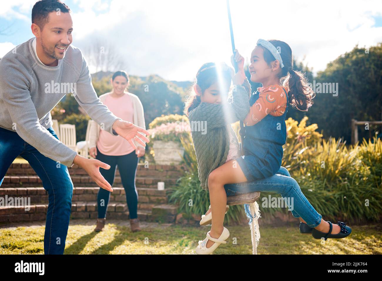 Unleash your inner child. a young family spending time together in a ...