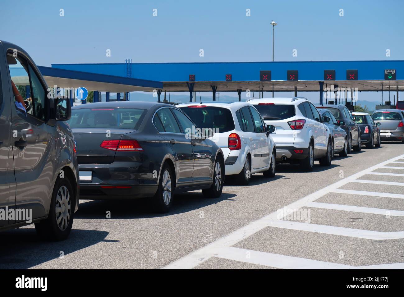 Cars on the road, border checkpoint Stock Photo - Alamy