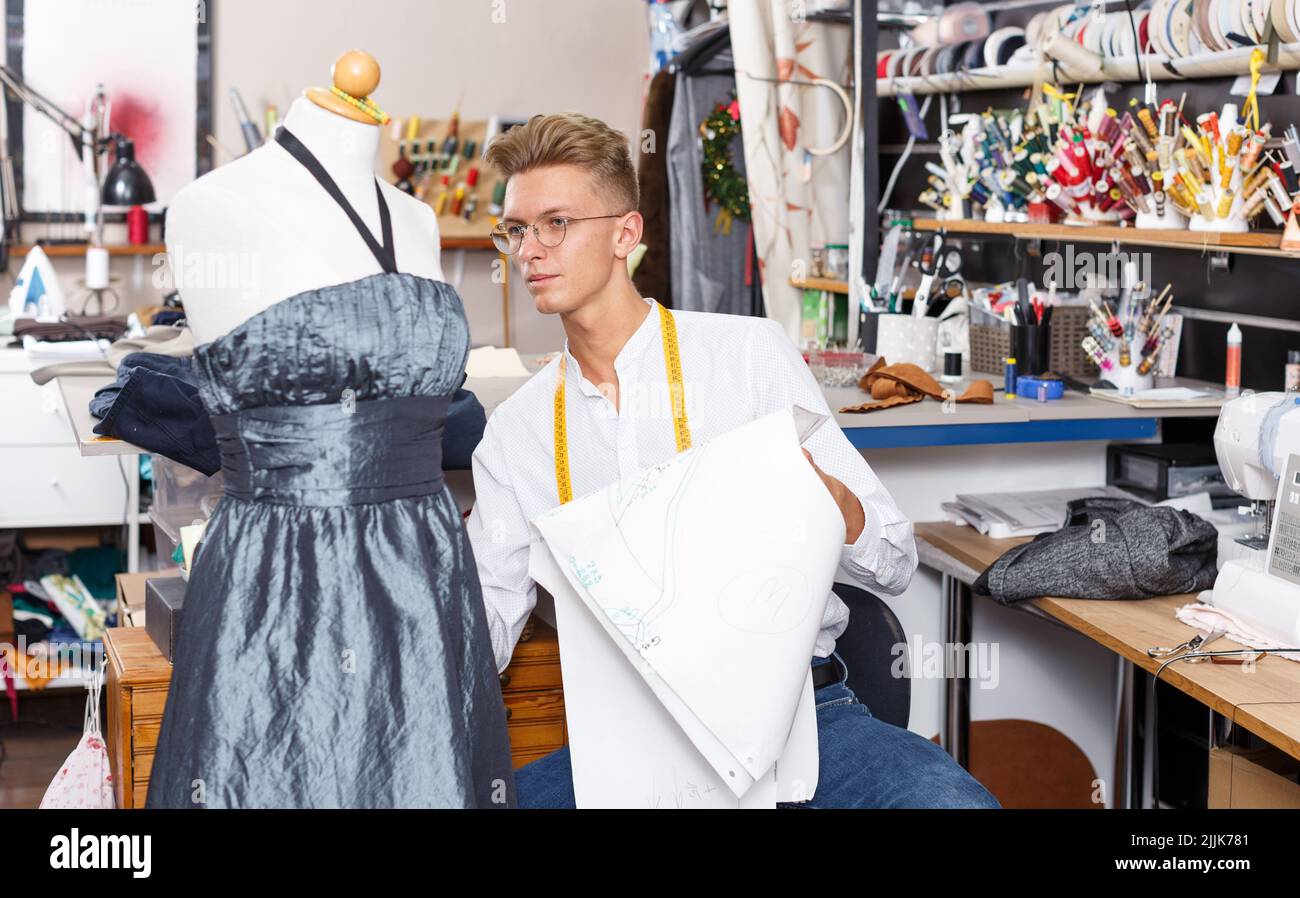 Dressmaker at work – creating dress style Stock Photo - Alamy