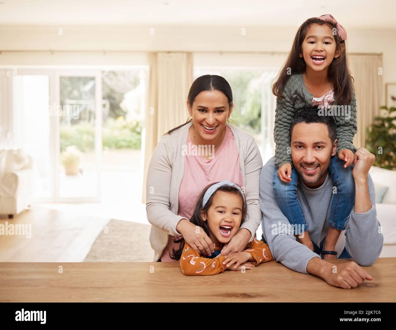 Our family means the world to us. a young family spending time together ...