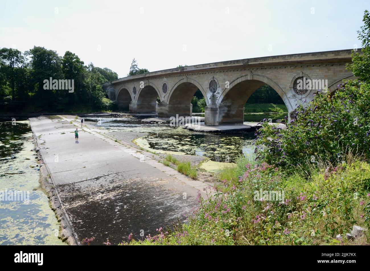 historic coldstream bridge on river tweed on england and scotland ...