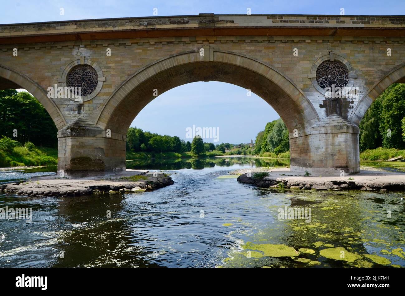 historic coldstream bridge on river tweed on england and scotland ...
