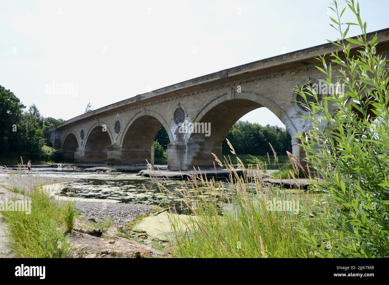 historic coldstream bridge on river tweed on england and scotland ...