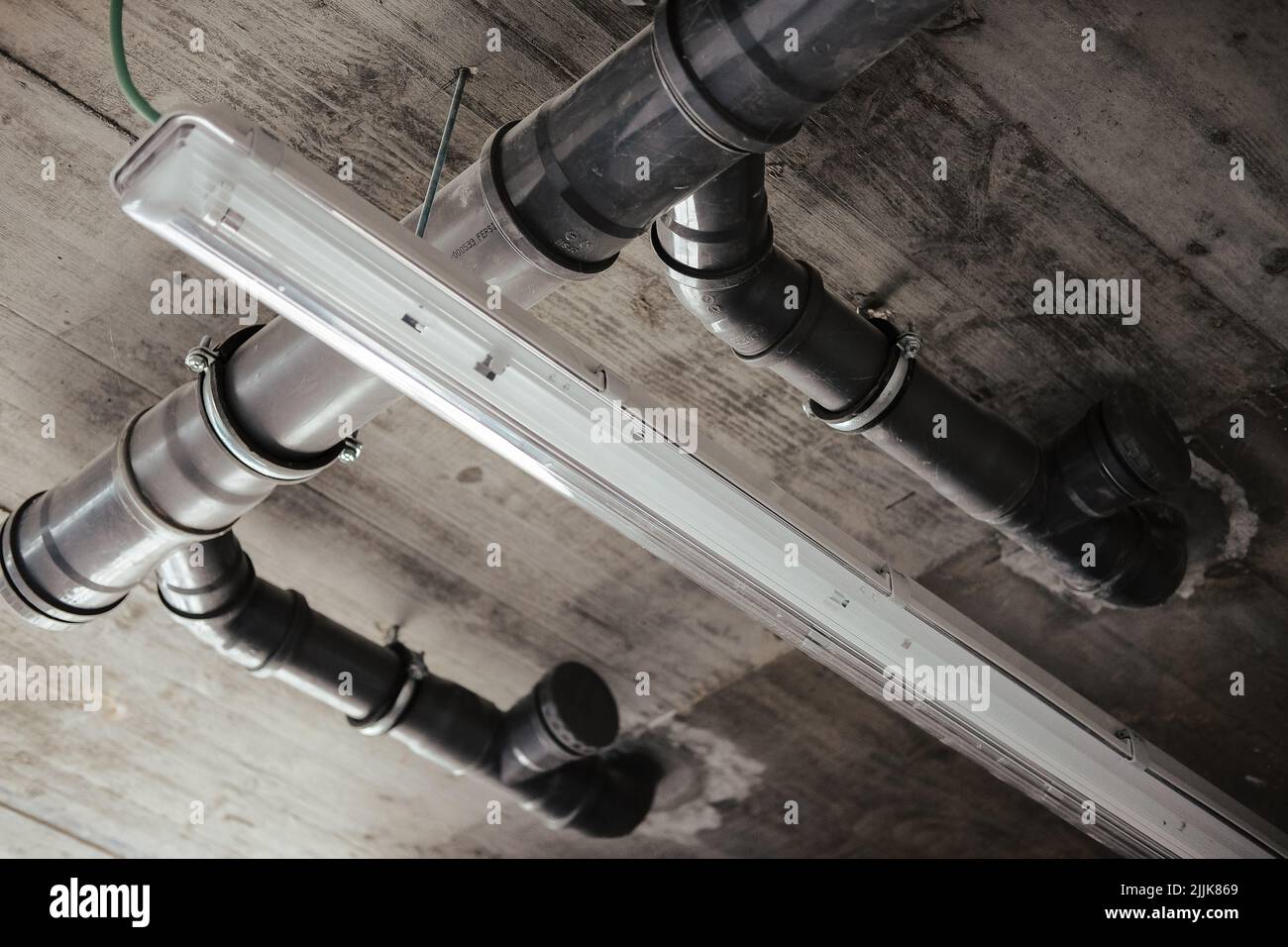 A view of industrial pipes inside a factory Stock Photo - Alamy