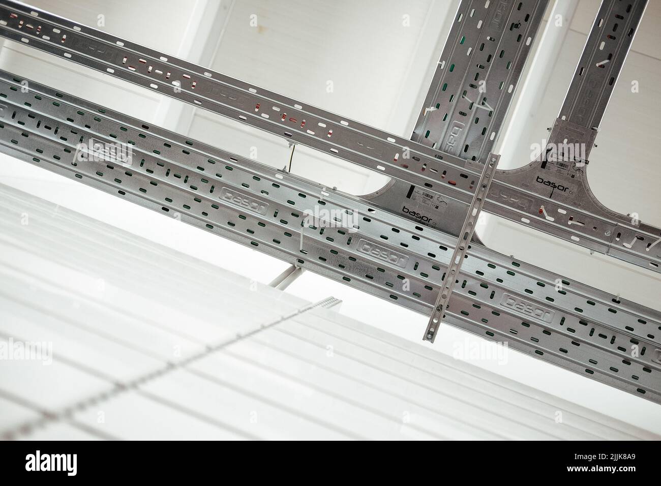 A low angle shot of silver structural elements in a white room Stock ...