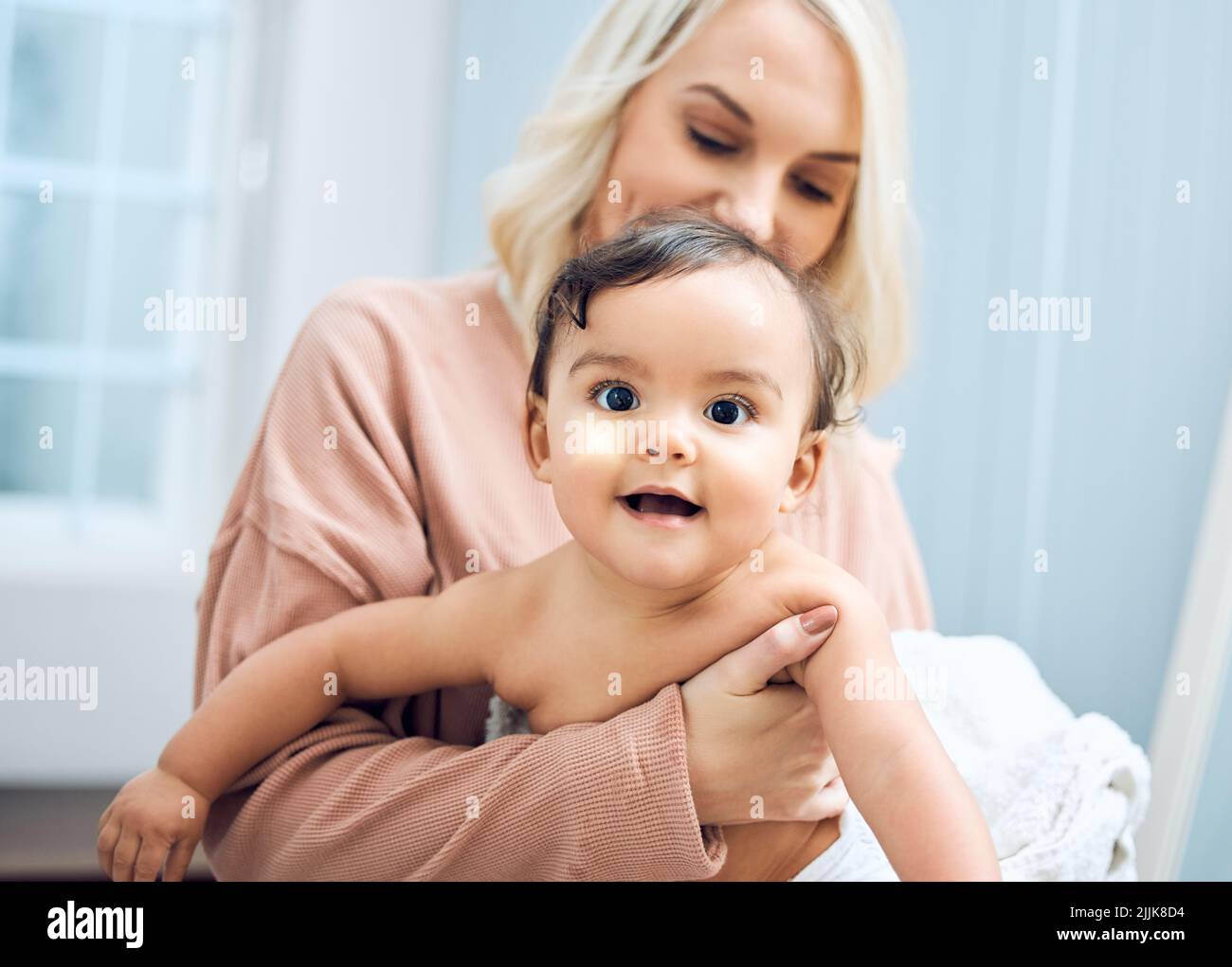 Its so nice to meet you. a woman bonding with her adorable baby girl ...