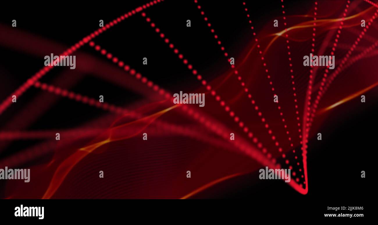 Image of red particles forming curved structure over undulating red ...