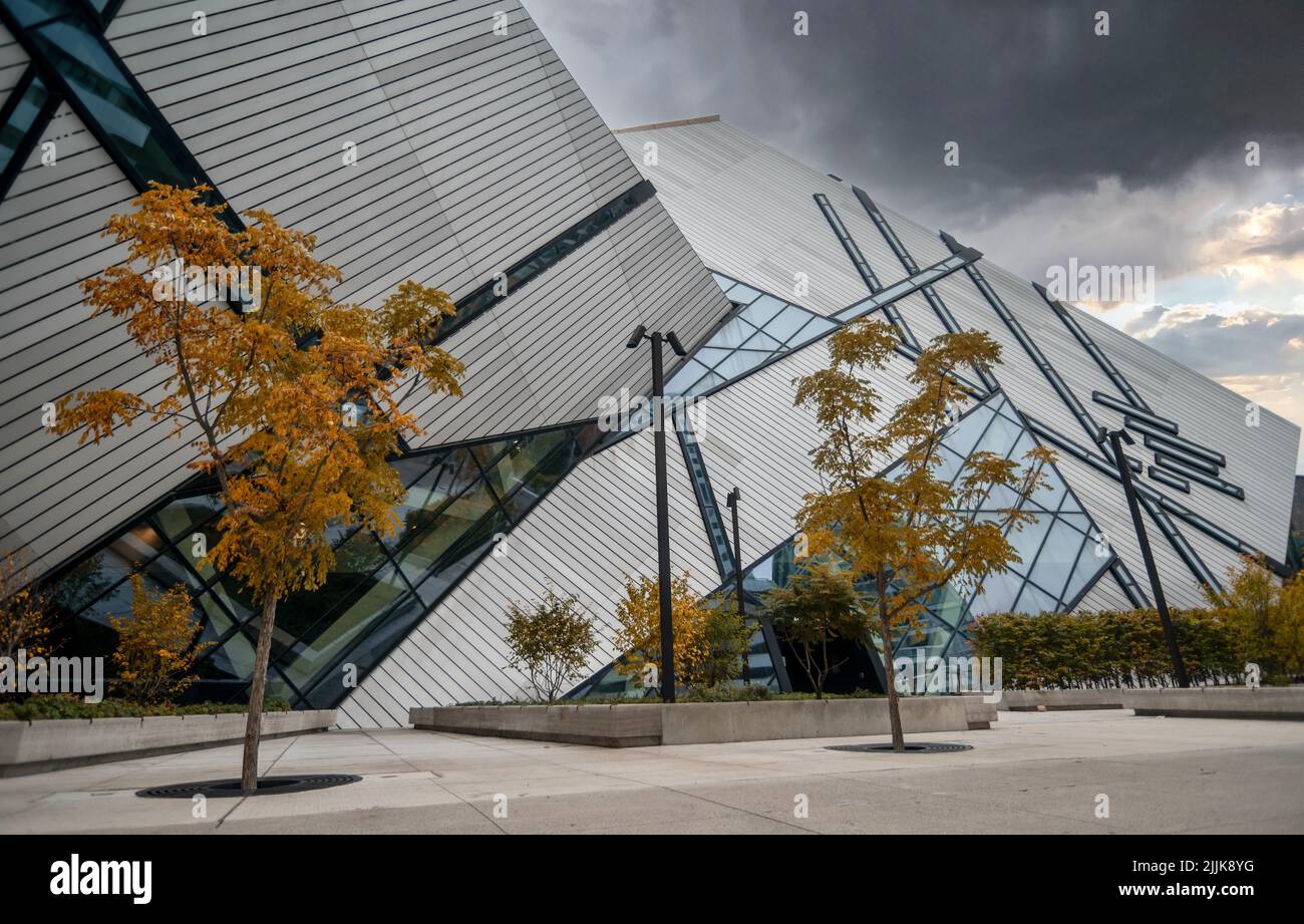 A view of Rom museum surrounded by autumn trees in Toronto Stock Photo ...