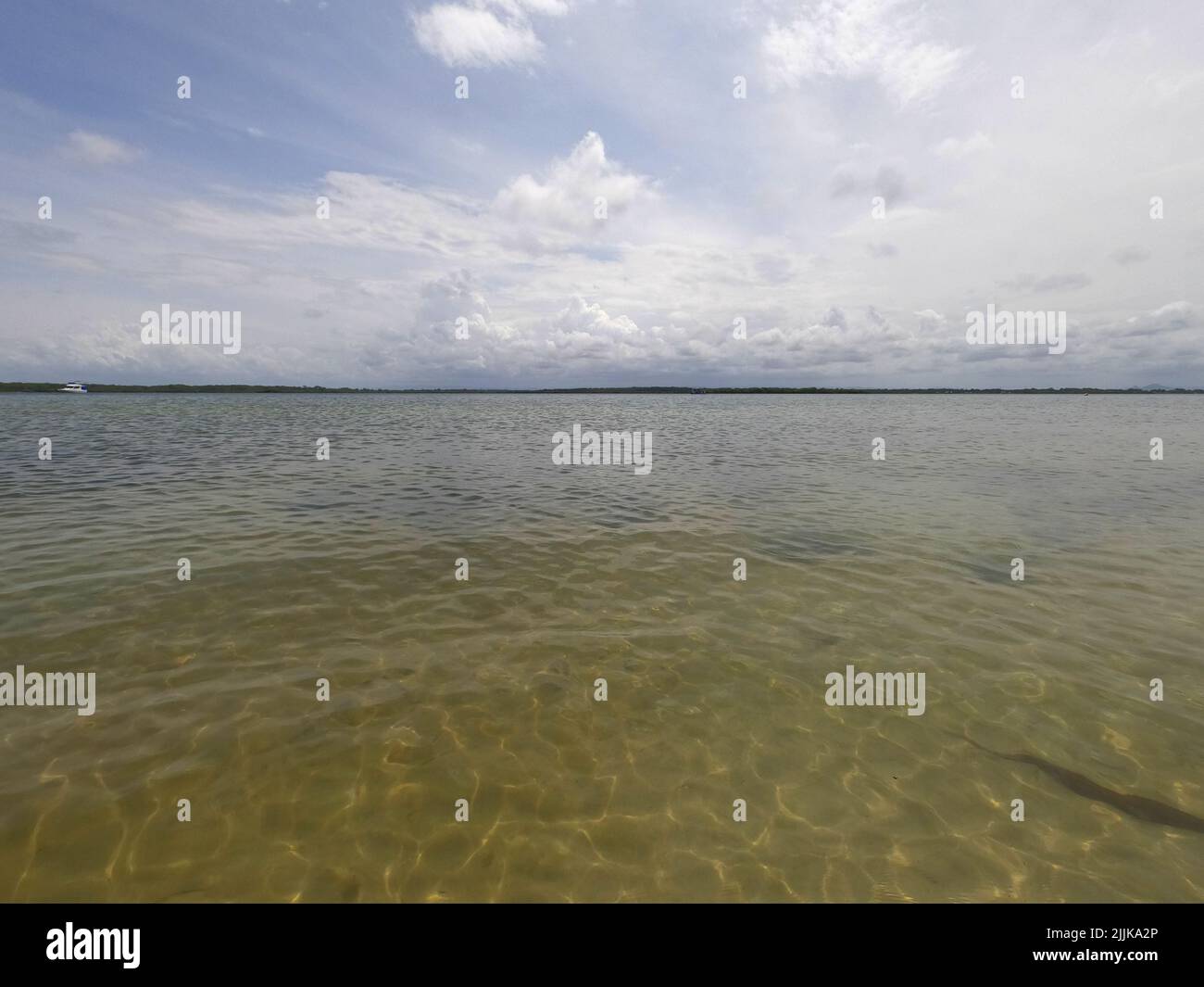 The peaceful waterscape of Pumicestone Passage on a gloomy day ...