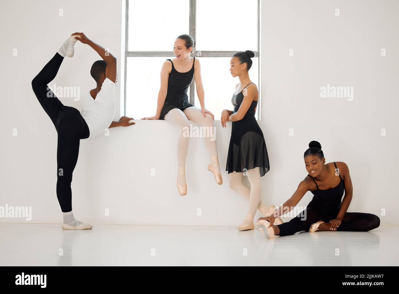 We dance to seduce ourselves. a group of ballet dancers practicing a ...