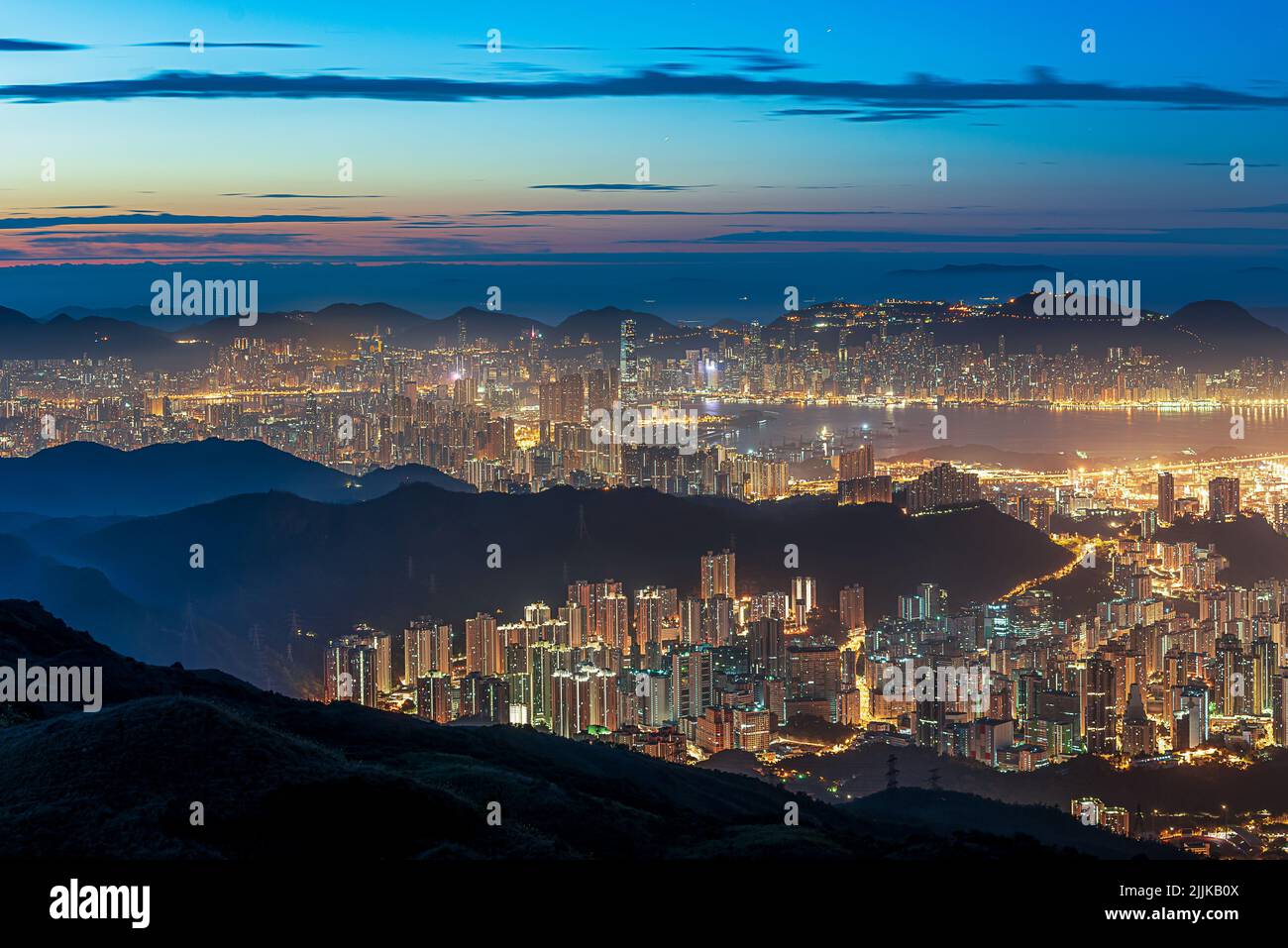 A beautiful view of tall buildings in Hong Kong from Tai Mo Shan Stock ...