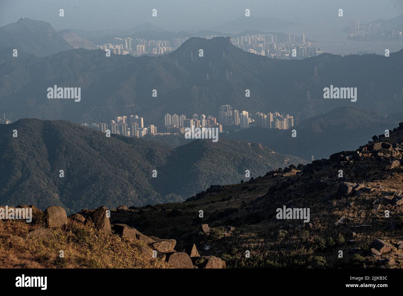 An aerial view of a town in between mountains Stock Photo - Alamy