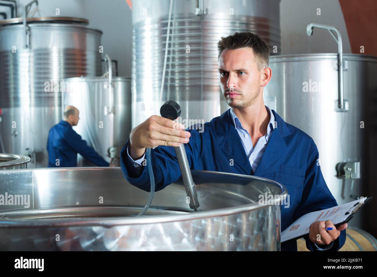 Portrait of man expert taking off data Stock Photo - Alamy