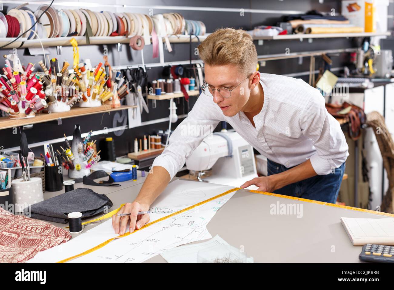 Dressmaker at work – creating pattern Stock Photo - Alamy