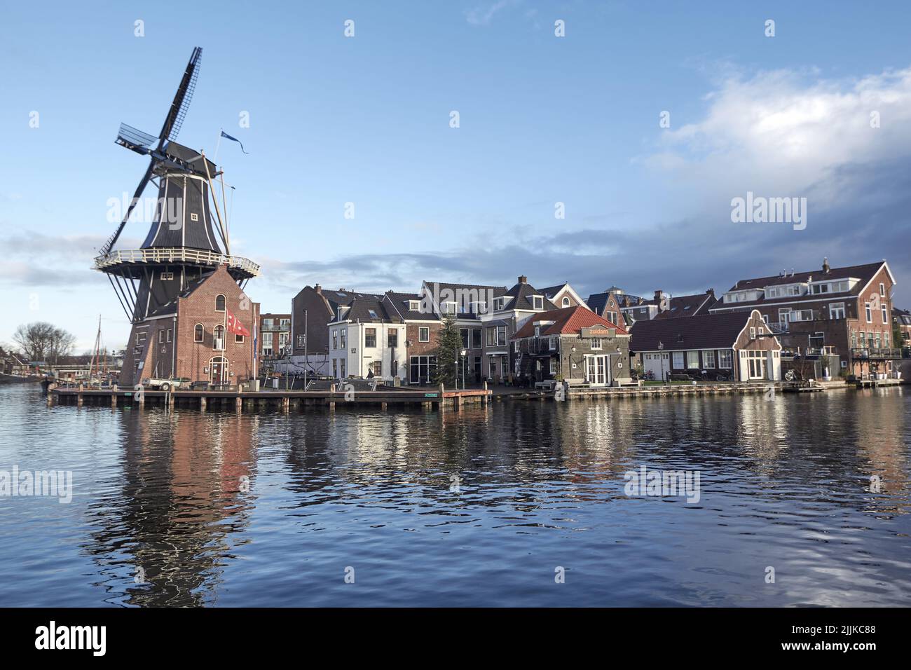 A scenic view of lakeside buildings in the Haarlem city in the ...
