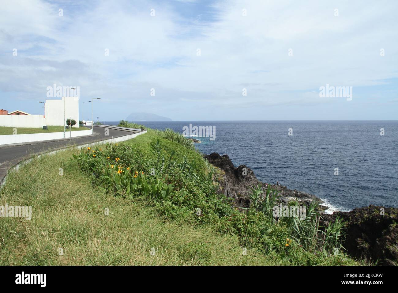 A beautiful view of the road near the cliff overseeing the ocean Stock ...