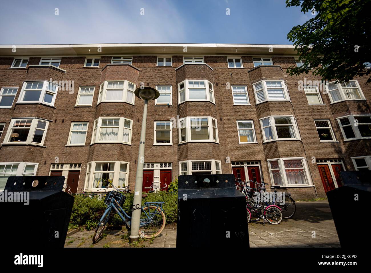 A last century Dutch build type residential housing with bicycles ...