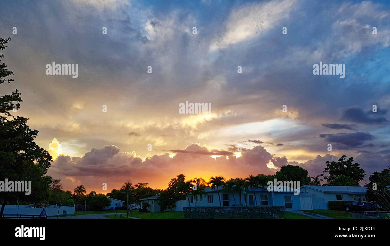 A residential area under a cloudy sunset sky in Miami, USA Stock Photo ...