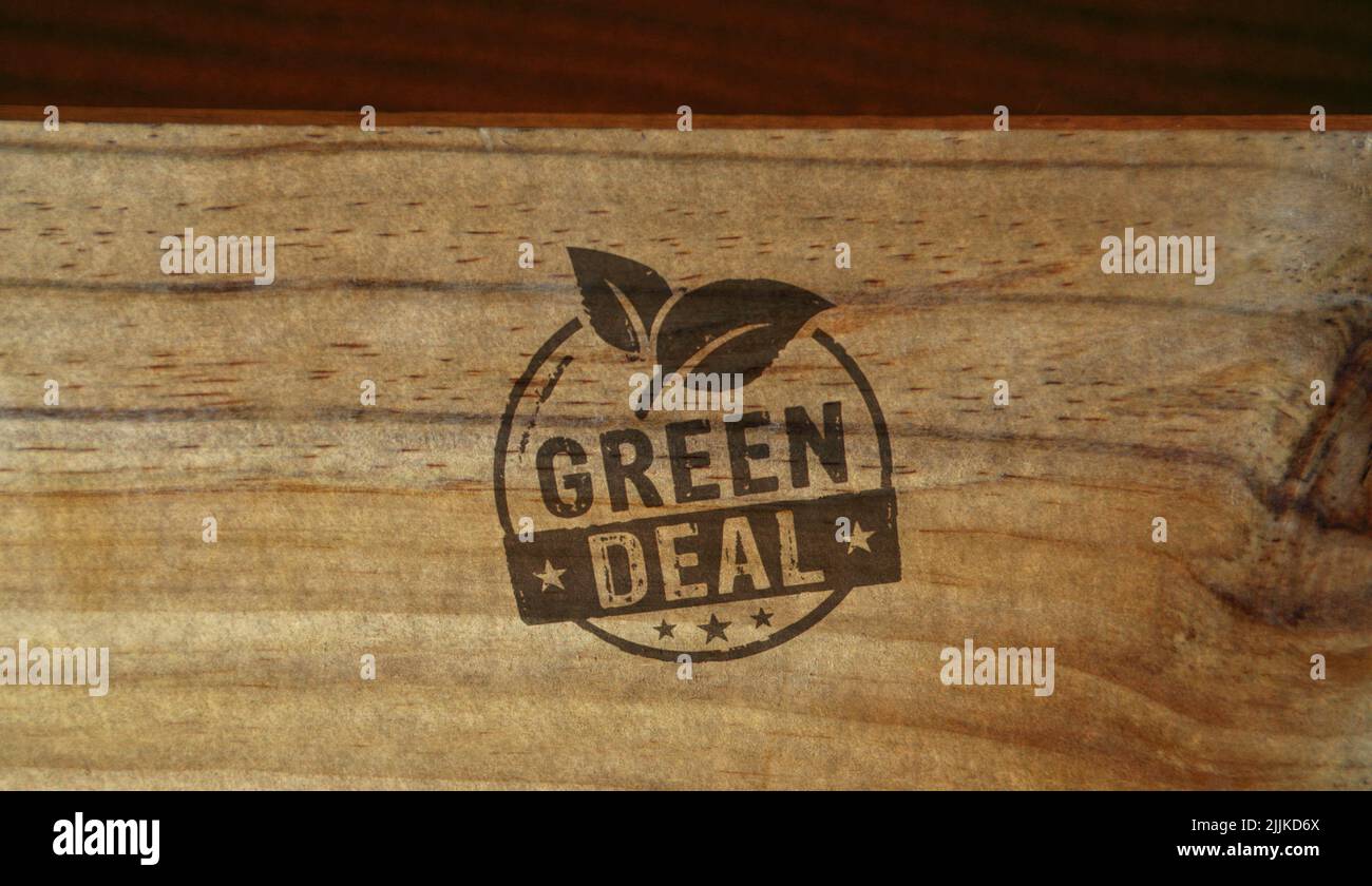 Green Deal stamp printed on wooden box. European Fit for 55 and reduce ...