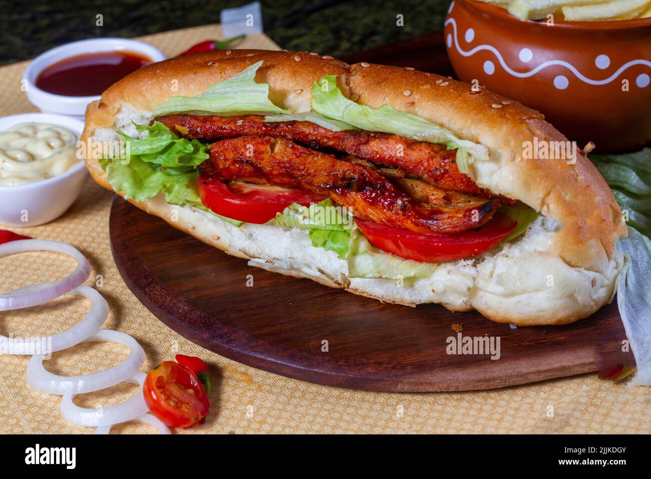 grill chicken roll , tomato sauce and drink top view of arabic street ...