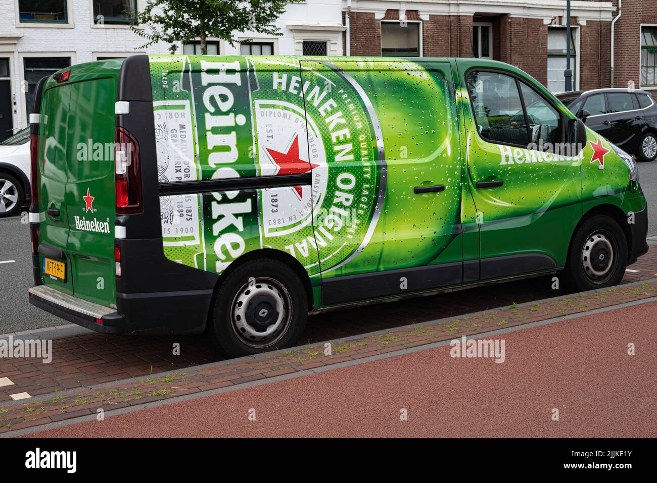 Beautiful green parked Heineken beer van in Haarlem, the Netherlands ...