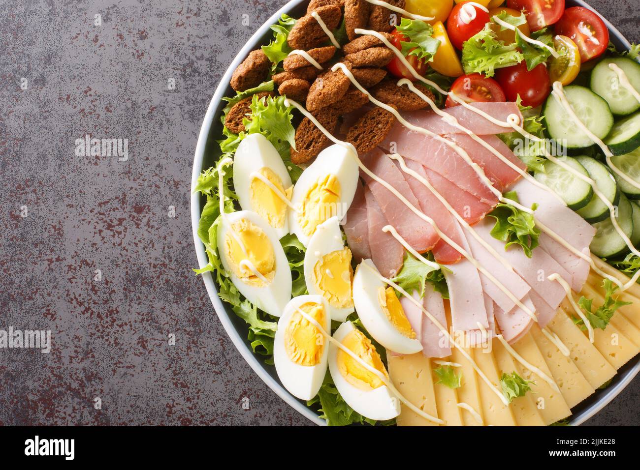 Classic chef salad is a greens salad that is served with assorted meats ...