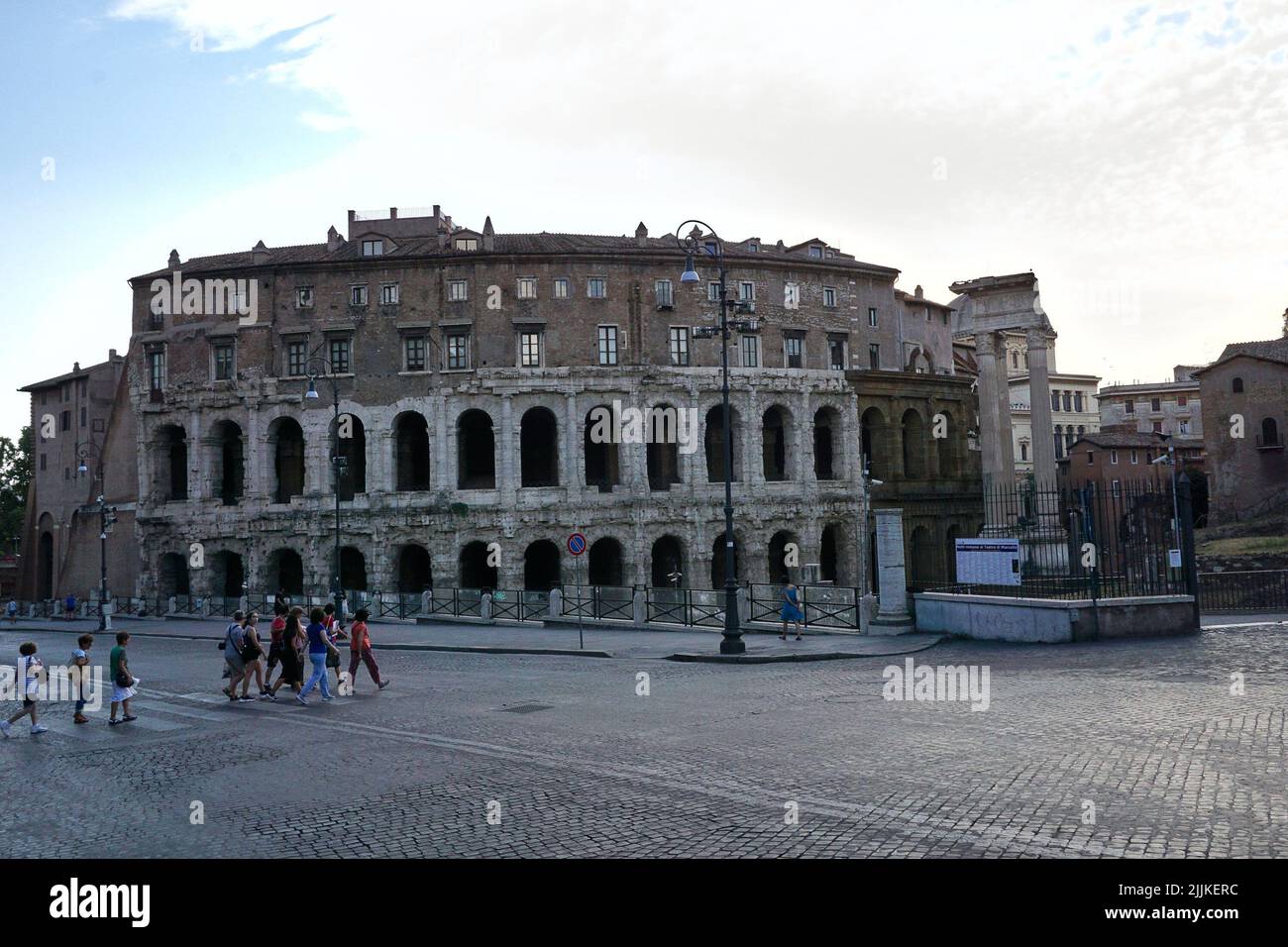 A beautiful view of walking people and Roman Amphitheatre in Italy ...