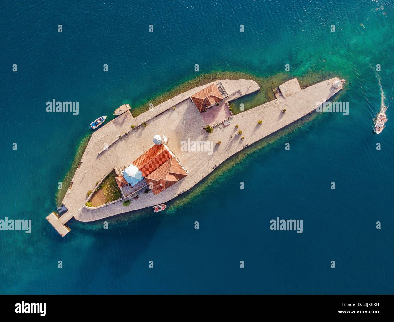 Picturesque island st. George and temple Gospa od Skrpela. Drone view ...