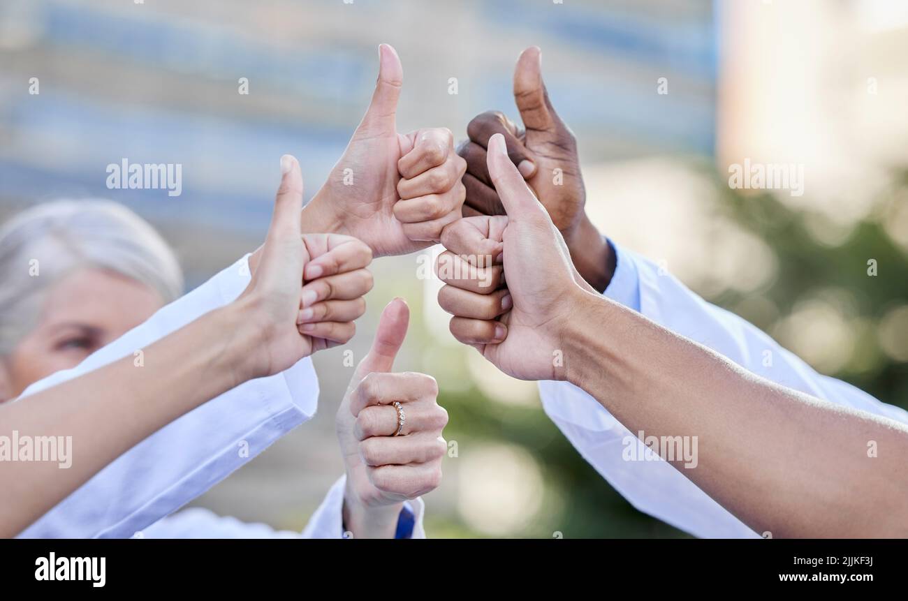 Were doing a great job as healthcare workers. a group of unrecognizable ...